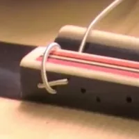 Changing Strings On A 12-Hole Bridge